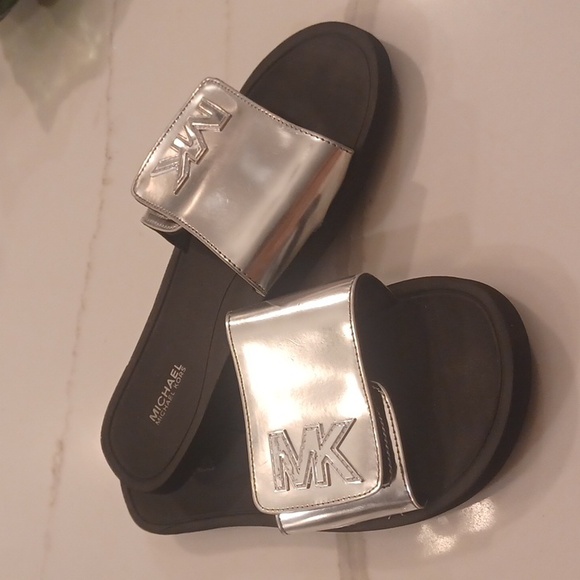 Michael Kors | Shoes | Michael Kors Mk Logo Metallic Silver Slip On ...